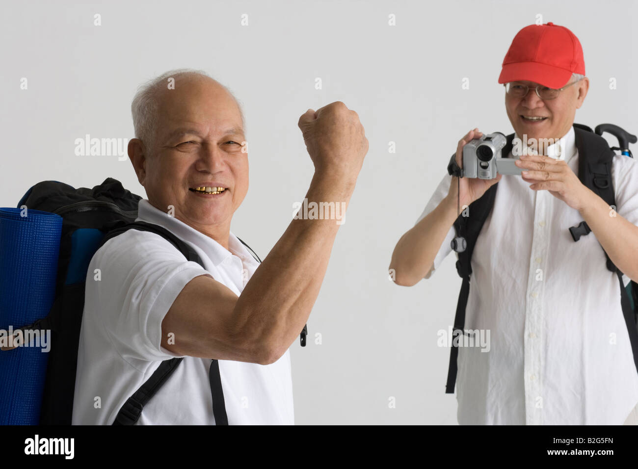 Man showing off friends hi-res stock photography and images - Alamy