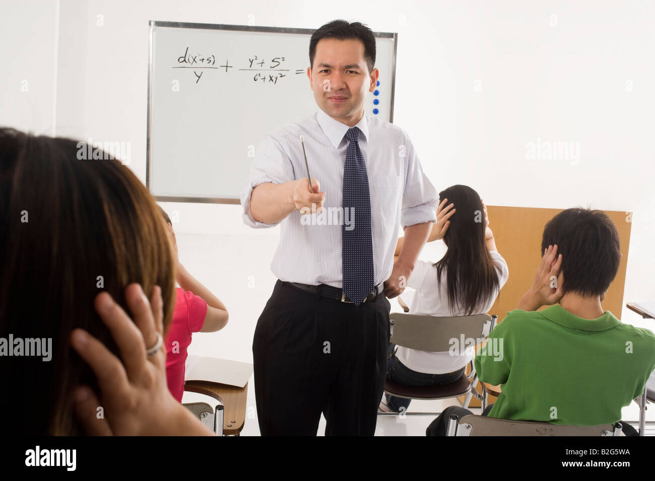 Portrait of a male professor scolding a student Stock Photo - Alamy