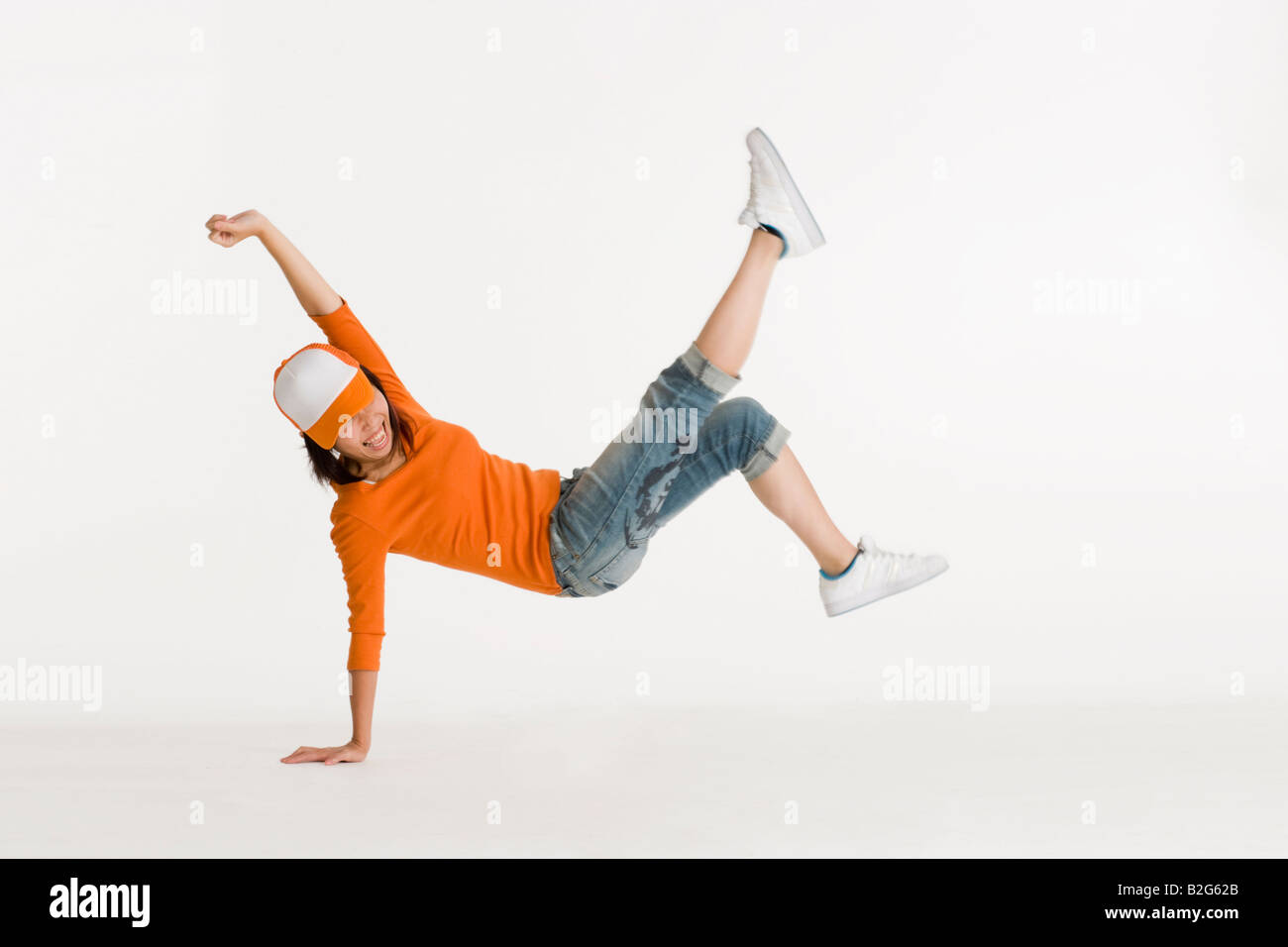 Side profile of a young woman dancing Stock Photo - Alamy