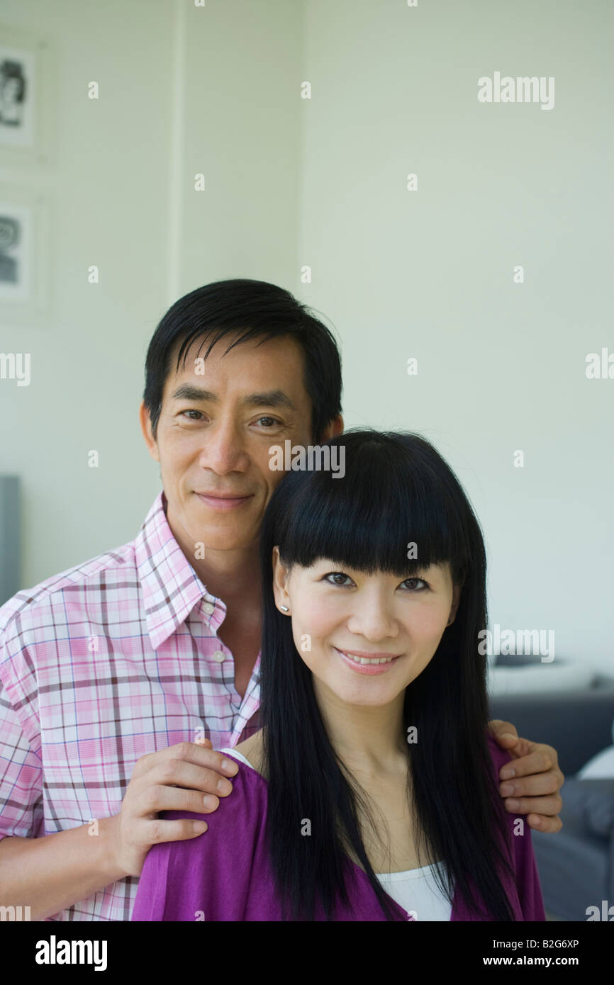 Portrait of a mid adult couple smiling Stock Photo - Alamy