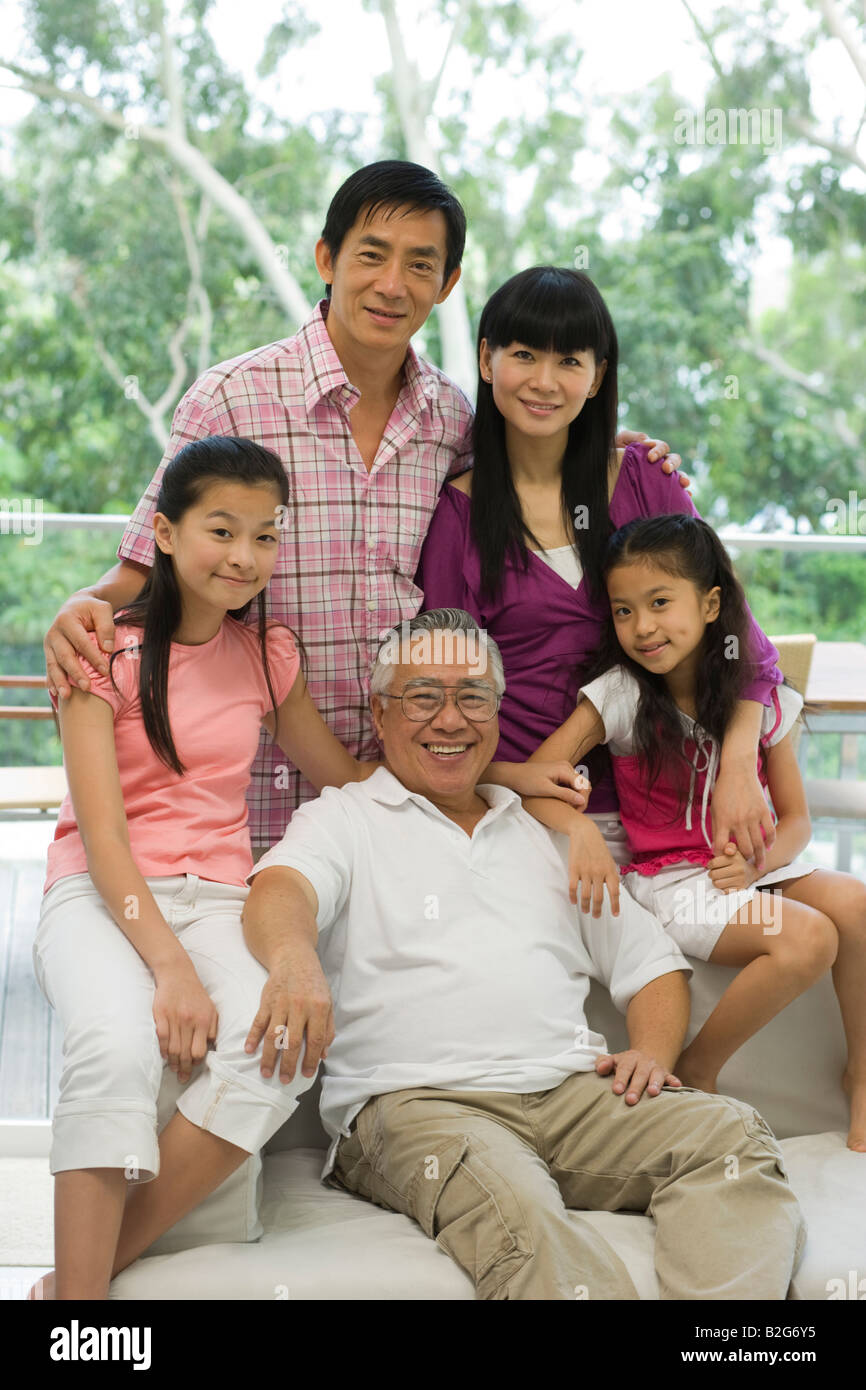 Family smiling together Stock Photo - Alamy