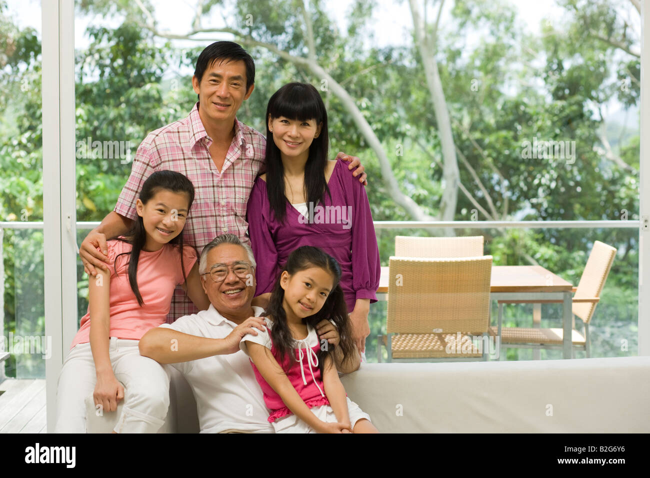 Family smiling together Stock Photo - Alamy