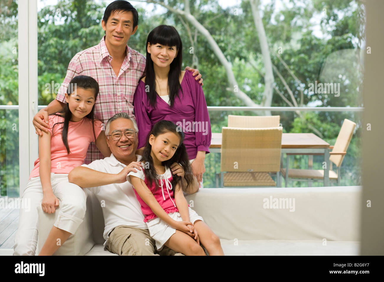Family smiling together Stock Photo - Alamy