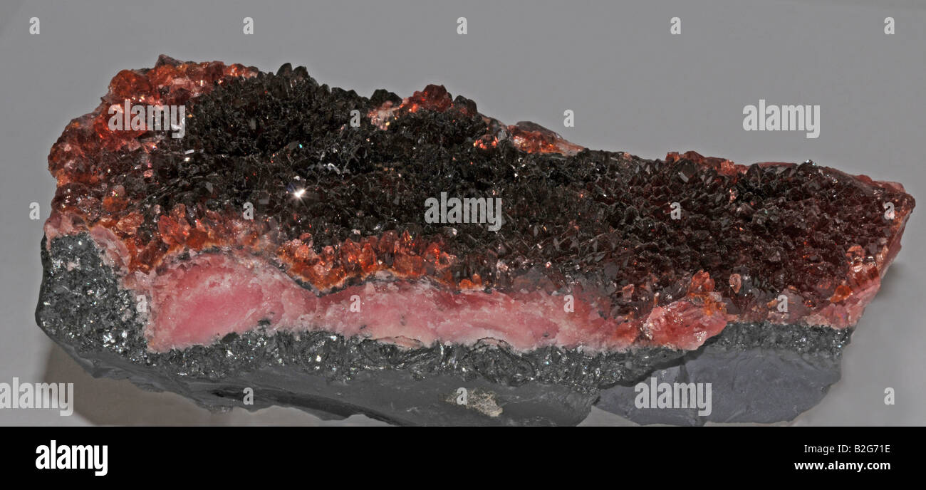 Dark red Rhodochrosite Crystals Stock Photo - Alamy