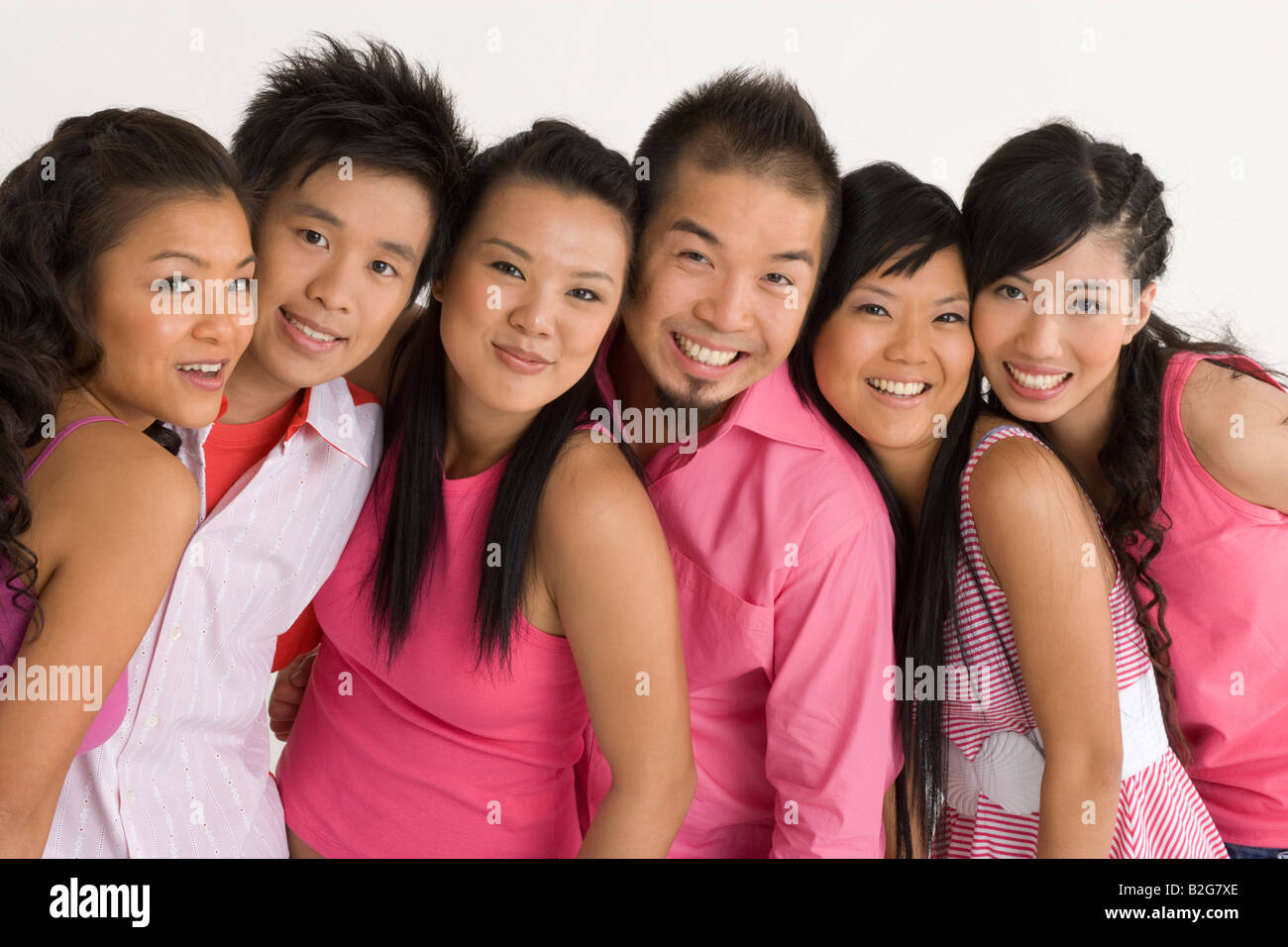 Two young men with four young women smiling Stock Photo - Alamy Two young men with four young women smiling Stock Photo - Alamy