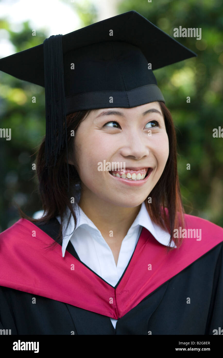 Close-up of a mid adult female graduate smiling Stock Photo - Alamy