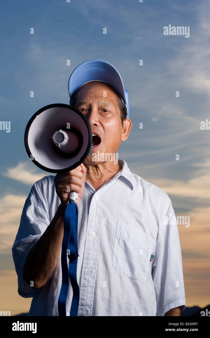 Standing holding communication megaphone authority hi-res stock ...