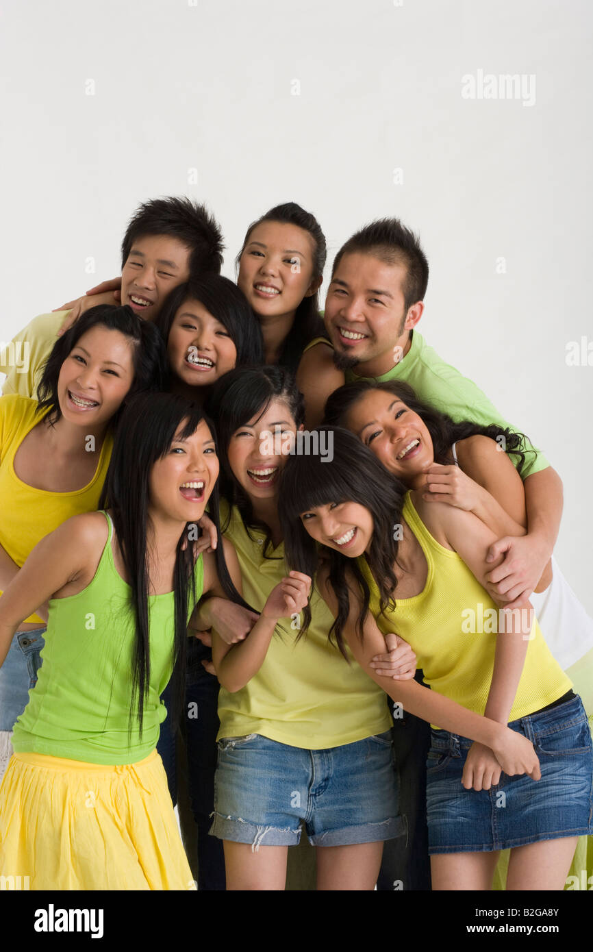Portrait of a group of friends smiling Stock Photo - Alamy