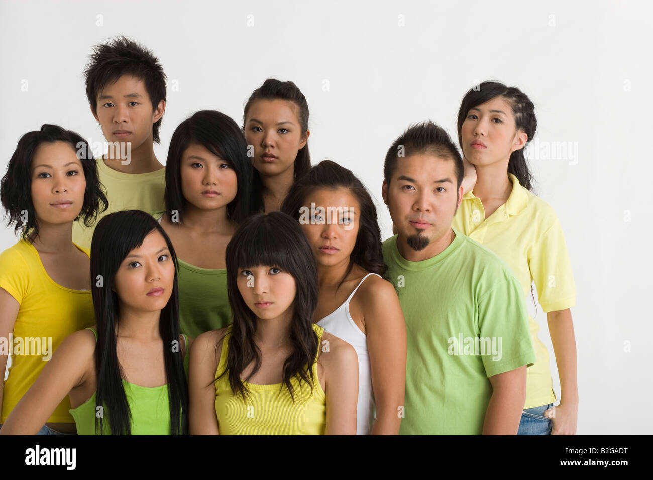 Portrait of a group of friends looking serious Stock Photo - Alamy