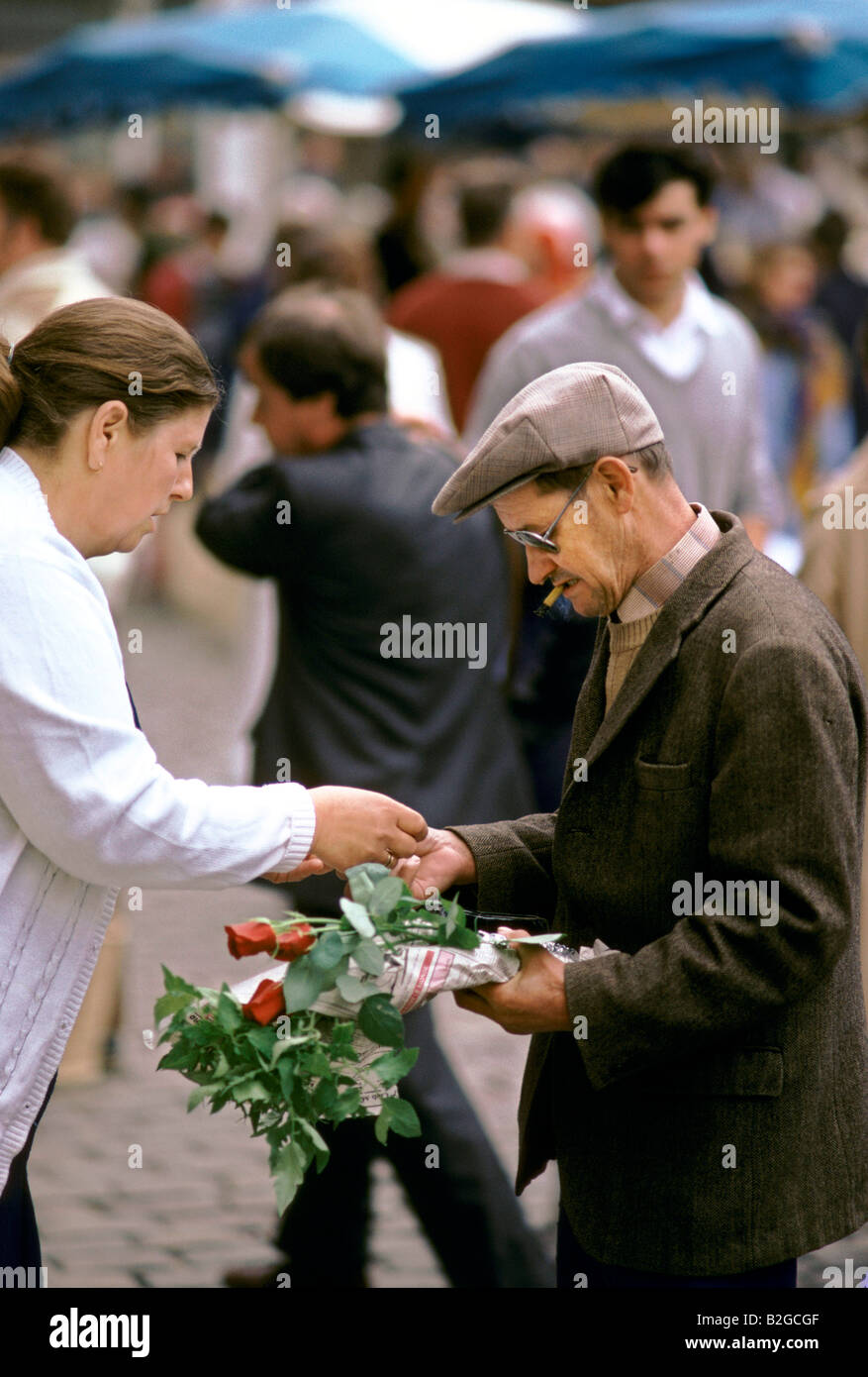 french man buying roses in a market Stock Photo - Alamy