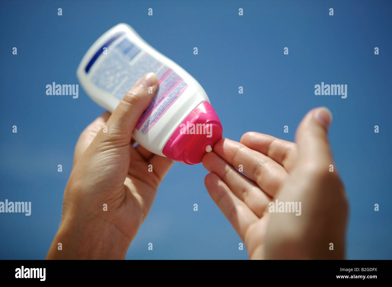 Applying Sunblock Cream To Hand Stock Photo - Alamy