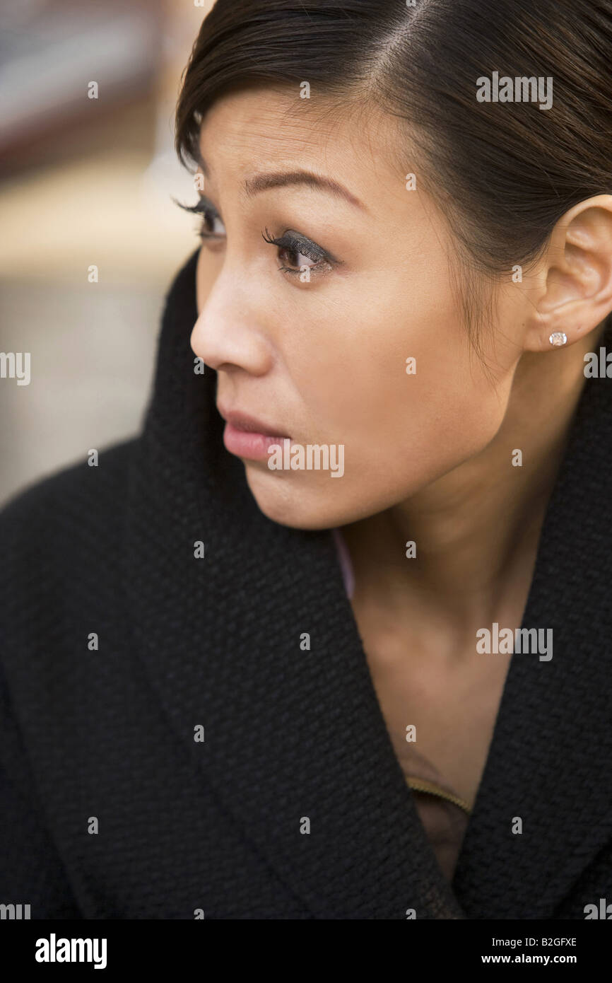 Close-up of a young woman staring Stock Photo - Alamy