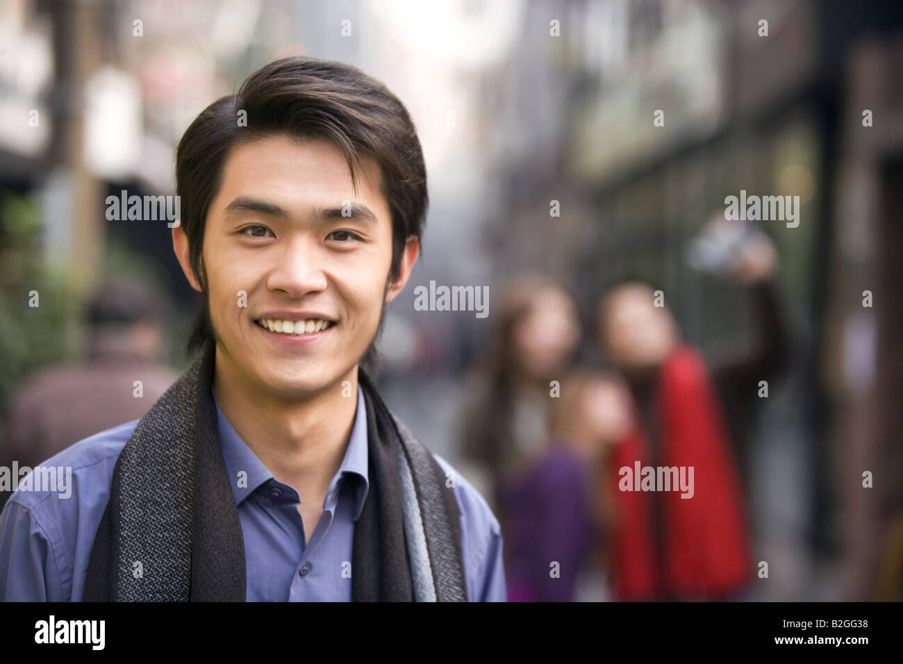 Portrait of a smiling young man Stock Photo - Alamy