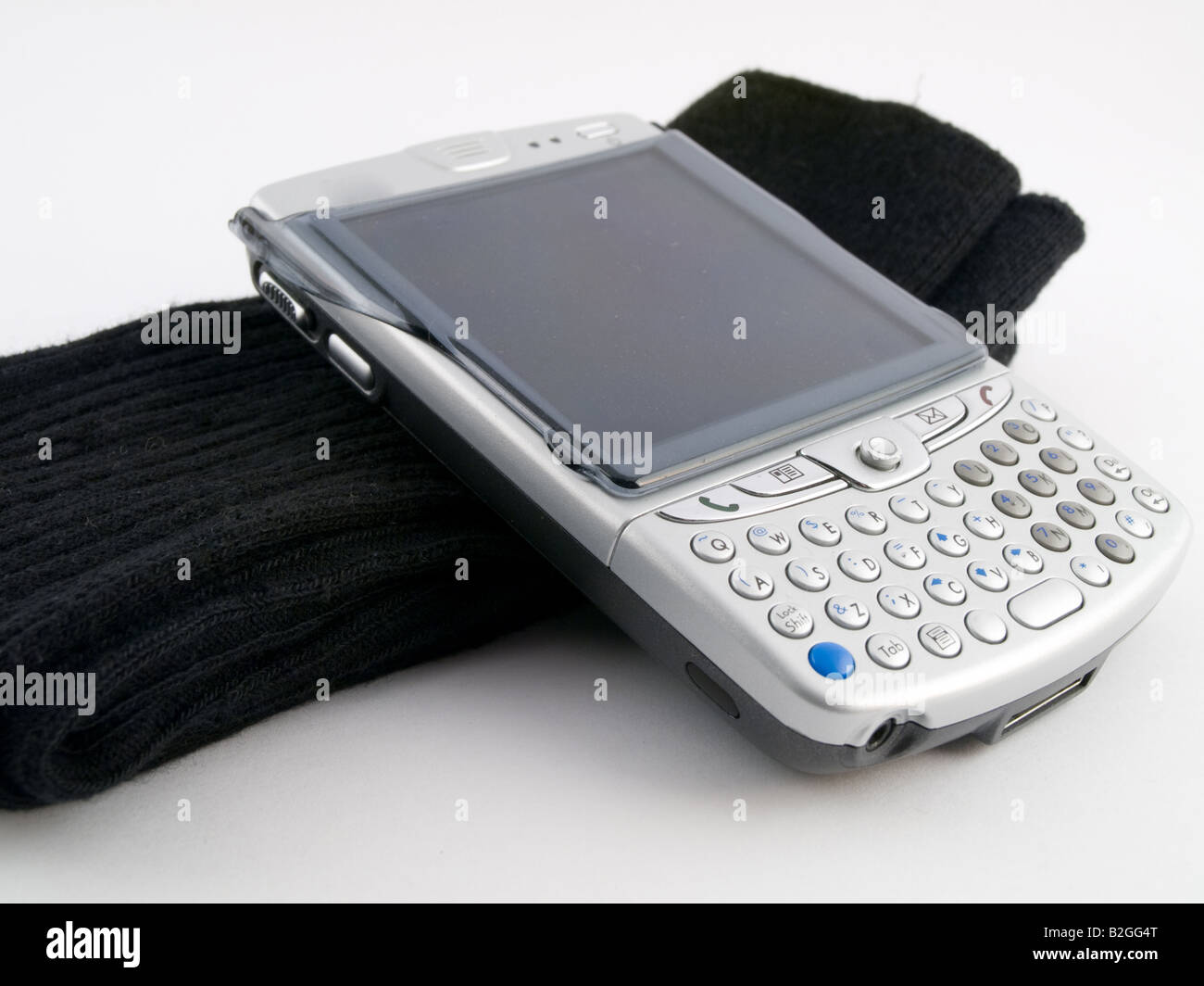 PDA Cellphone with Black Work Business Socks on White Background Stock ...