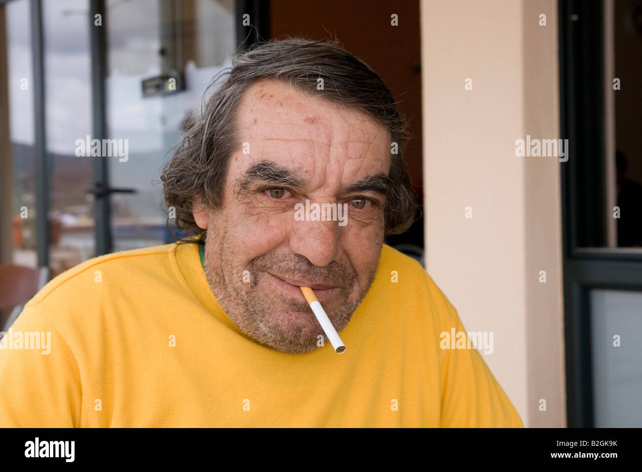 Greece the port town of Galifa man at a local restaurant Stock Photo ...