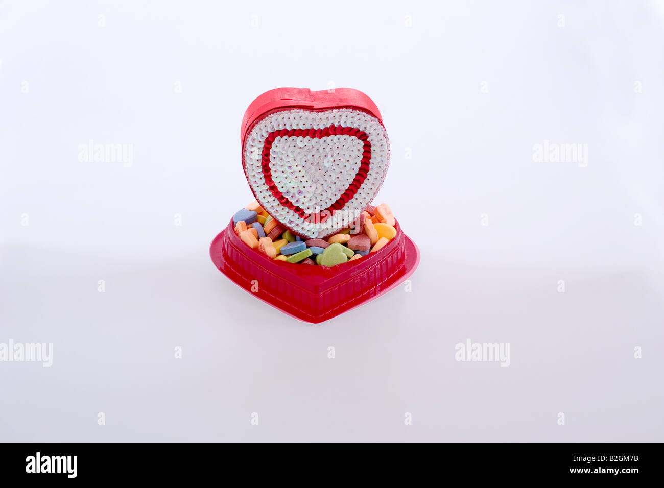 Small heart box atop a small box of heart shaped candies Stock Photo ...
