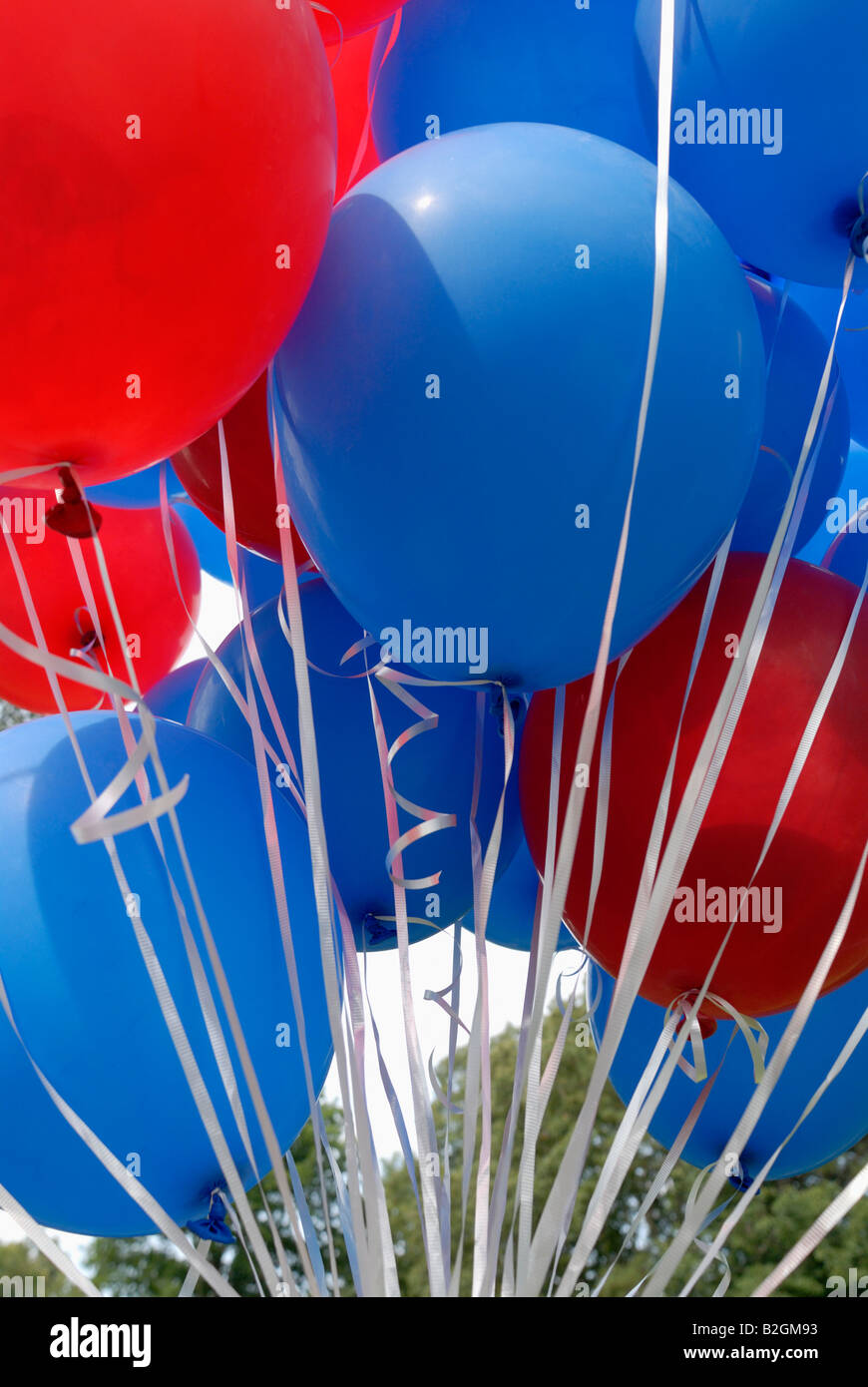 Red and Blue Balloons with white ribbon on the 4th of July Stock Photo ...