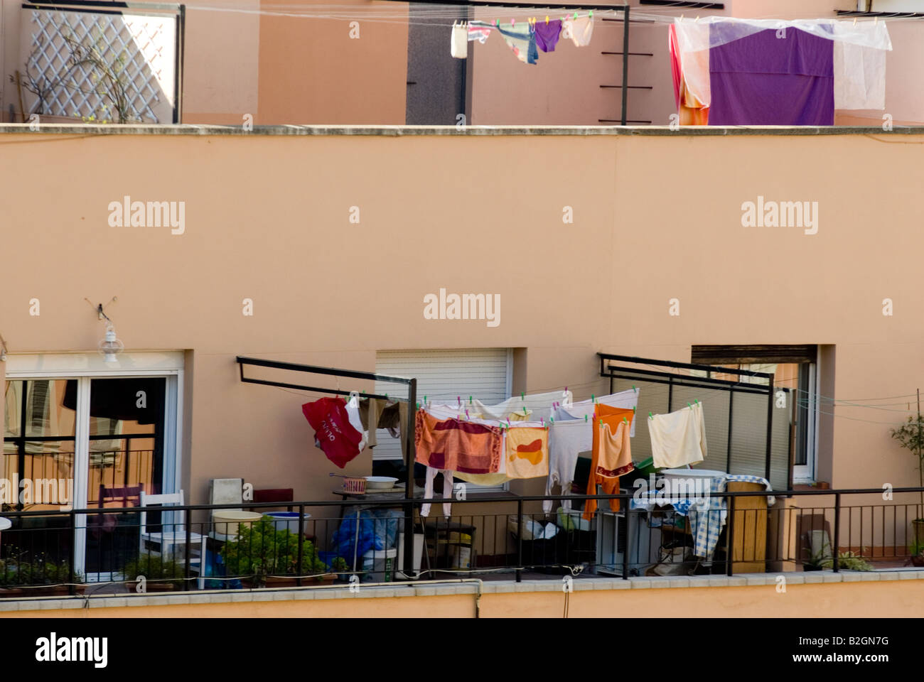 balcony with washing clothes hanging barcelona spain Stock Photo - Alamy
