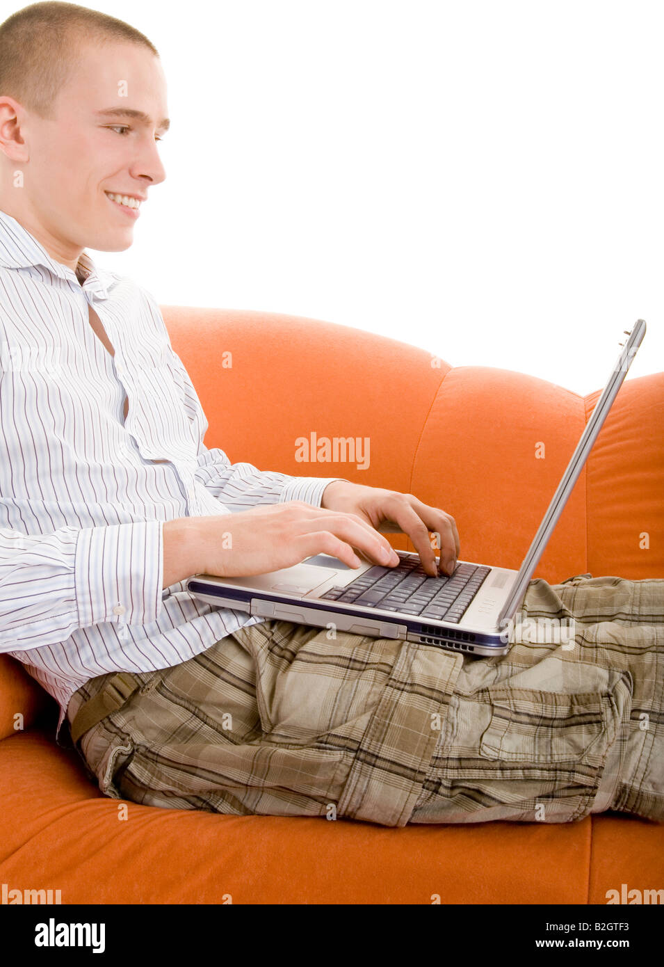 young man laptop notebook coumputer pc couch sofa working smile smiling ...