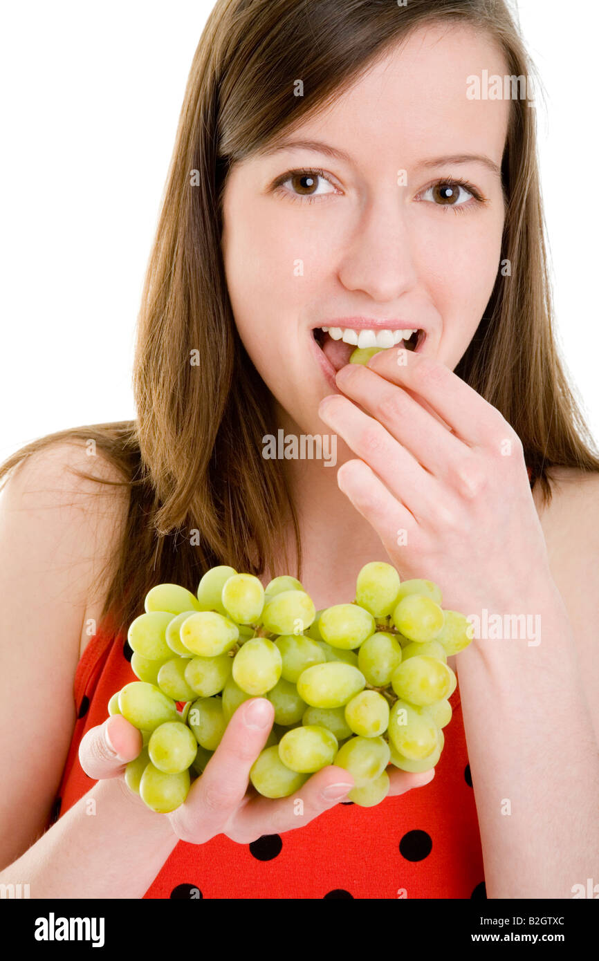 young beautiful attractive woman eating grapes wellness sound nurture ...