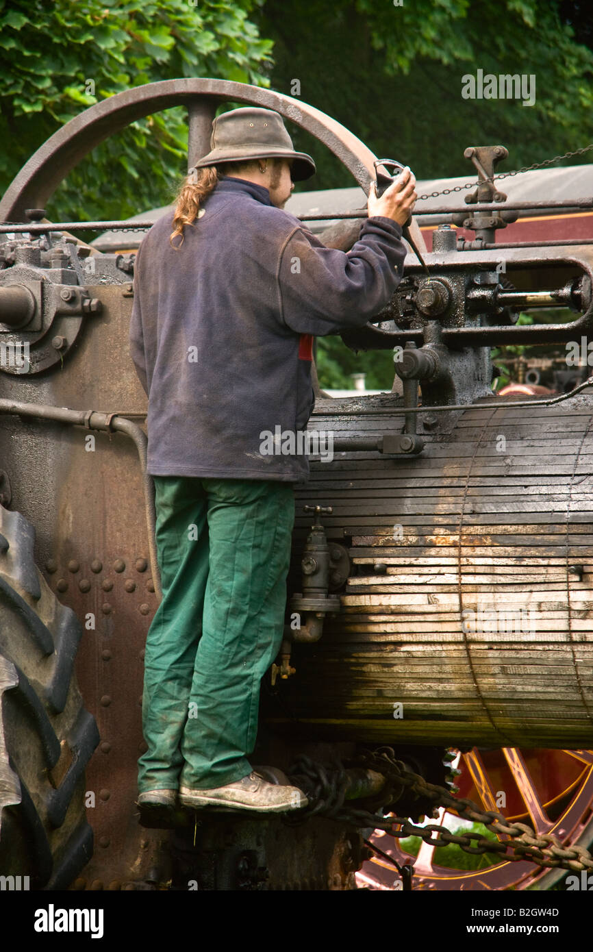 Man servicing a traction engine at Masham Steam Rally 2008 Stock Photo ...