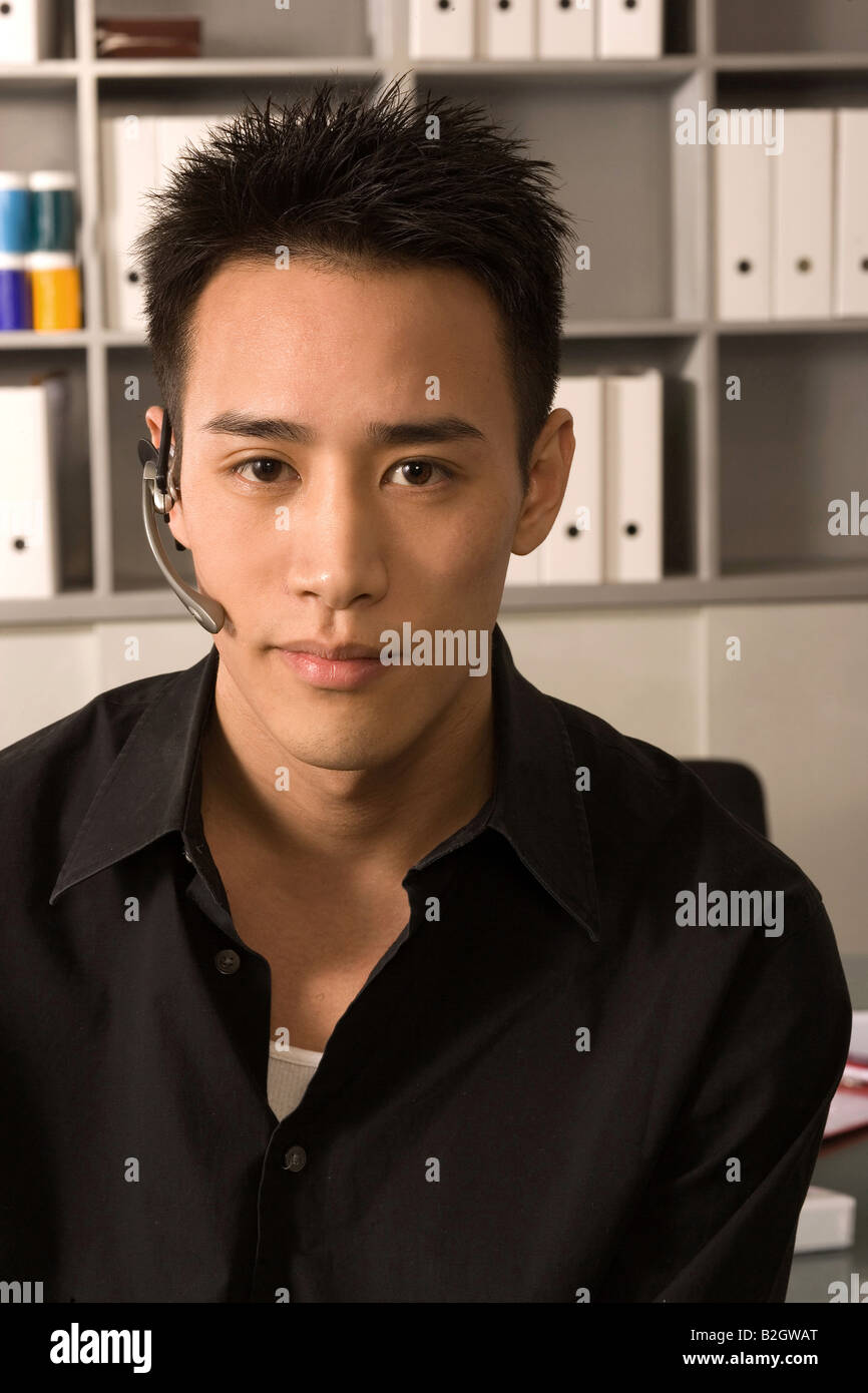 Portrait of a male customer service representative Stock Photo - Alamy