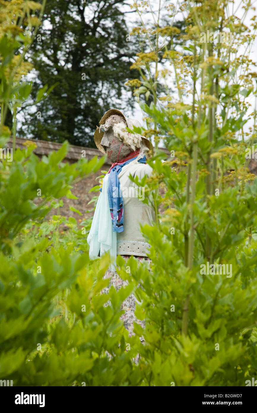 A scarecrow dressed as an old woman Stock Photo - Alamy