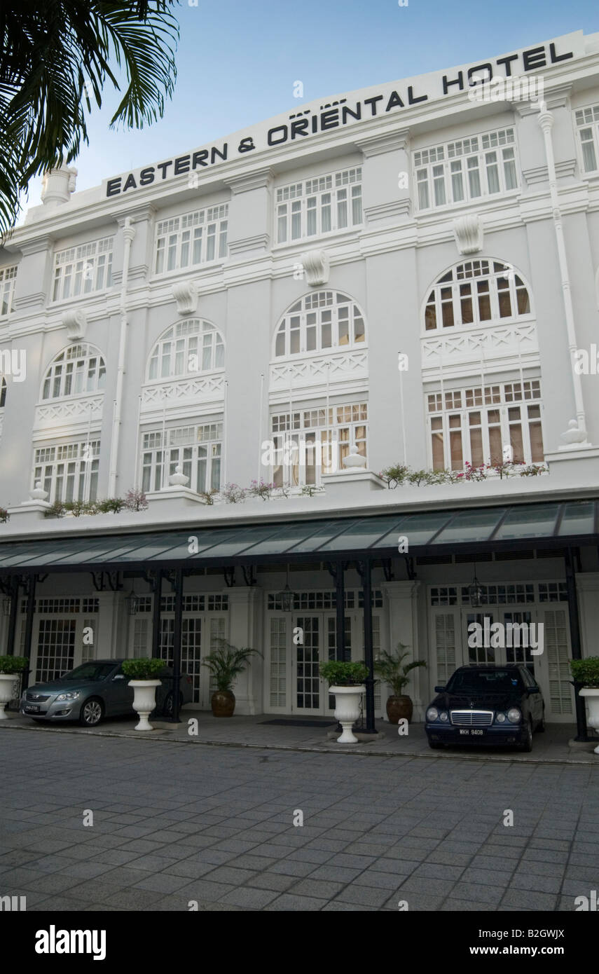 Grey and white colonial facade of the E & O luxury hotel founded by the ...