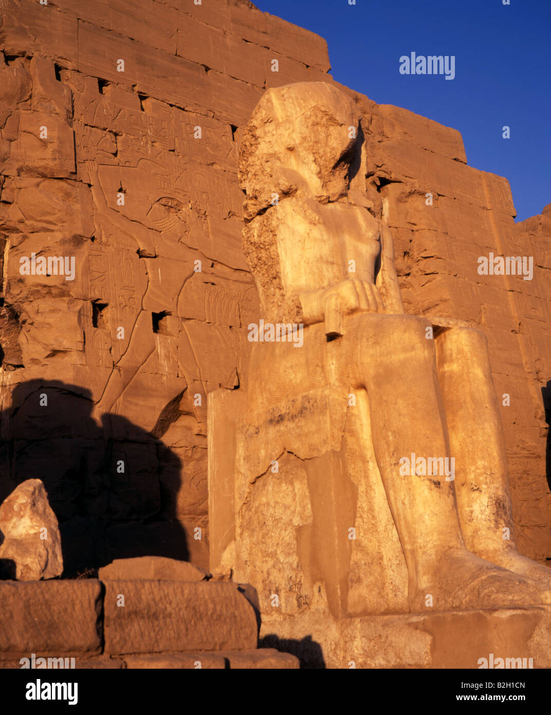 Karnak Temple of Amun, seated Colossus, Luxor, Egypt Stock Photo - Alamy