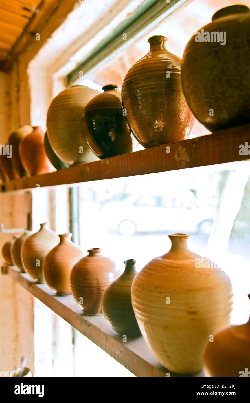 Stack of clay plant pots on a shelf hi-res stock photography and images ...