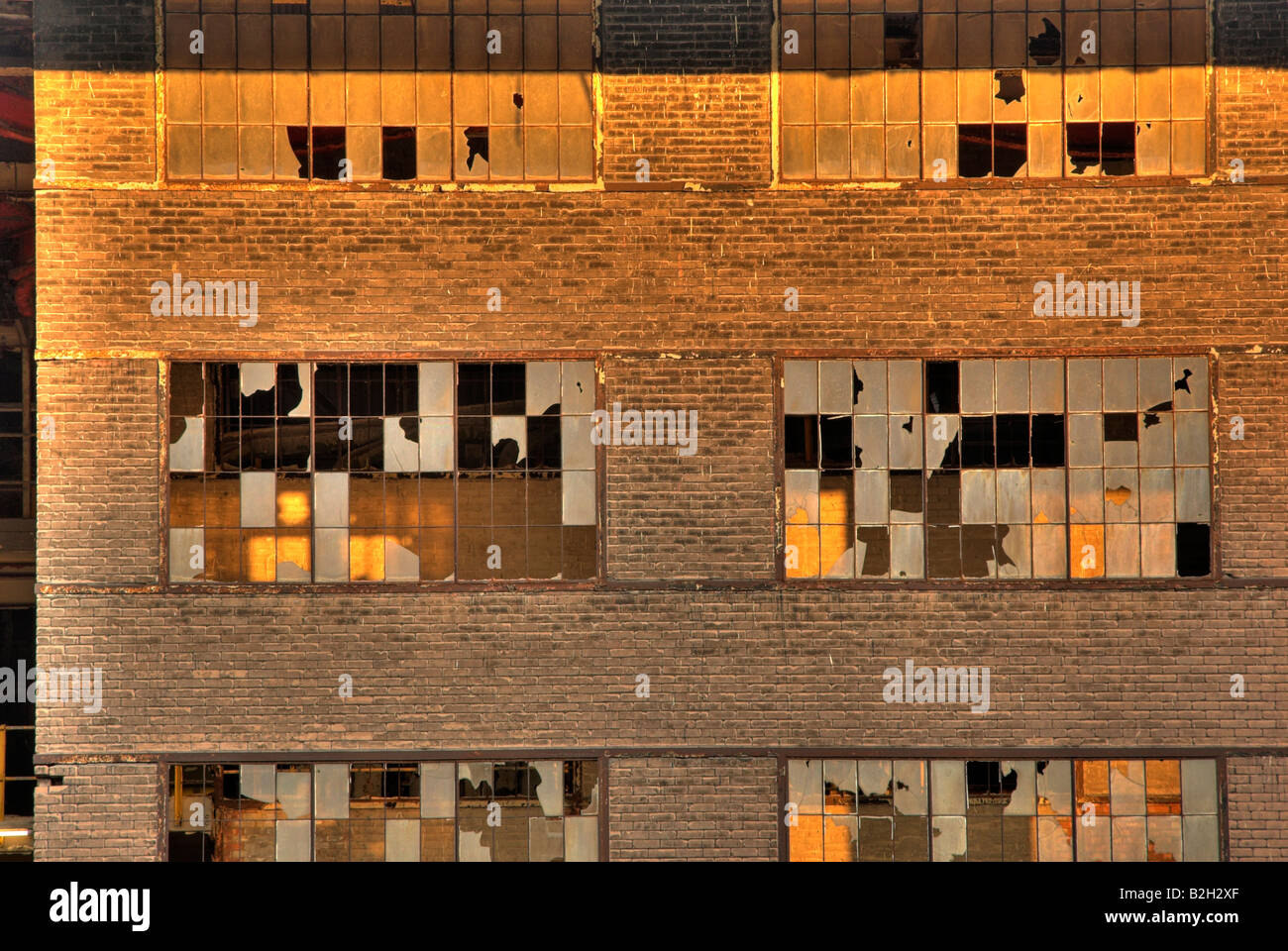 Broken windows of a derelict factory, Brunner Mond, Winnington ...