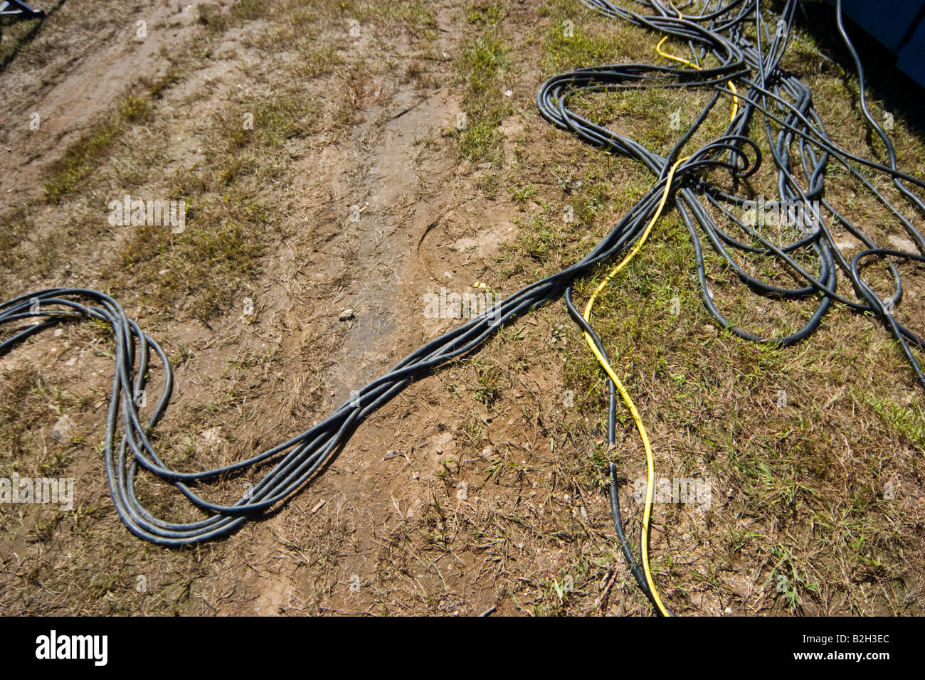Electrical cables looking like a pile of spaghetti laying together on ...