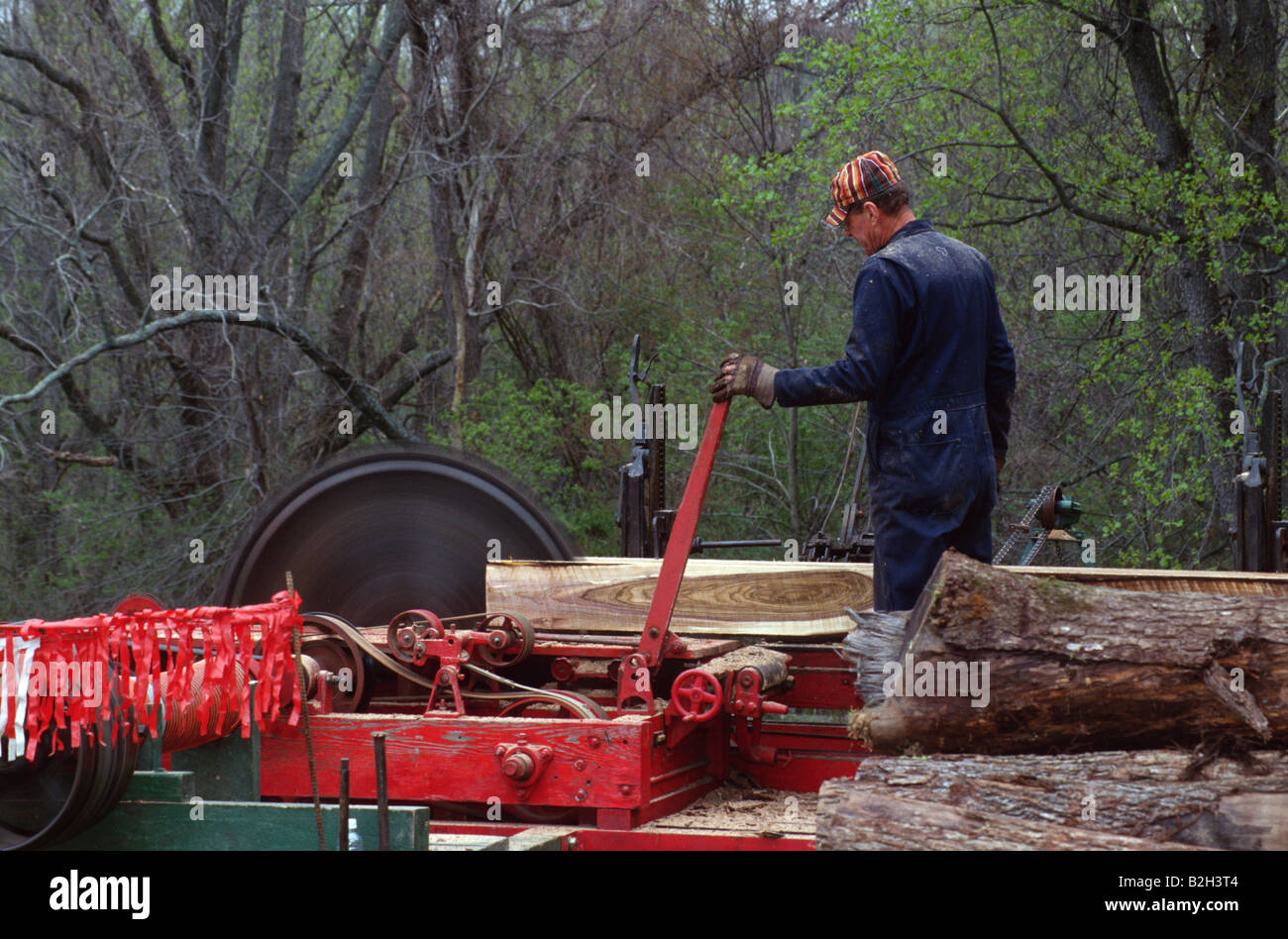 Sawmill mobile in operation Stock Photo - Alamy