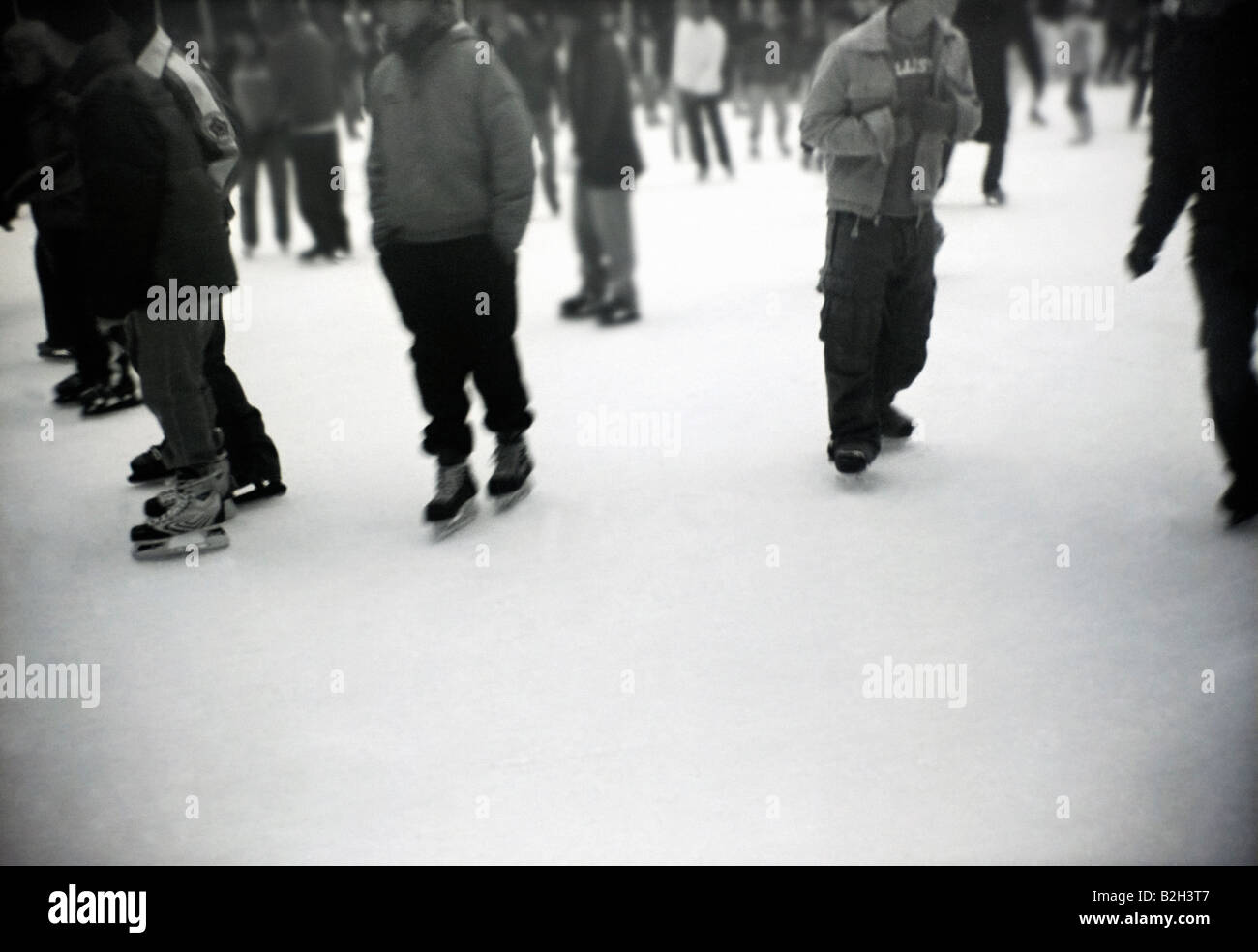 Skaters maneuver the packed Pond at Bryant Park ice skating rink in New ...