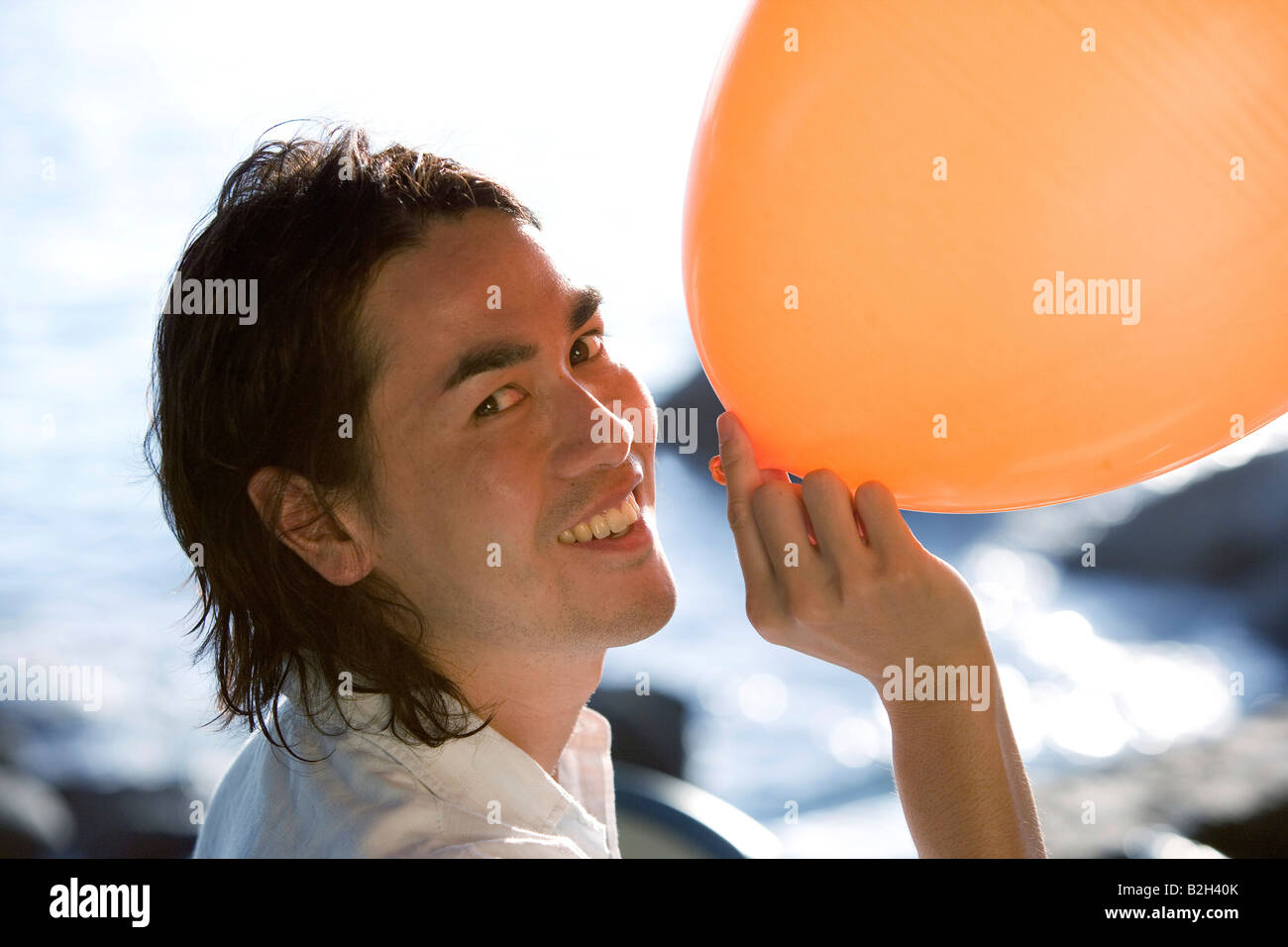 Man with a balloon hi-res stock photography and images - Alamy