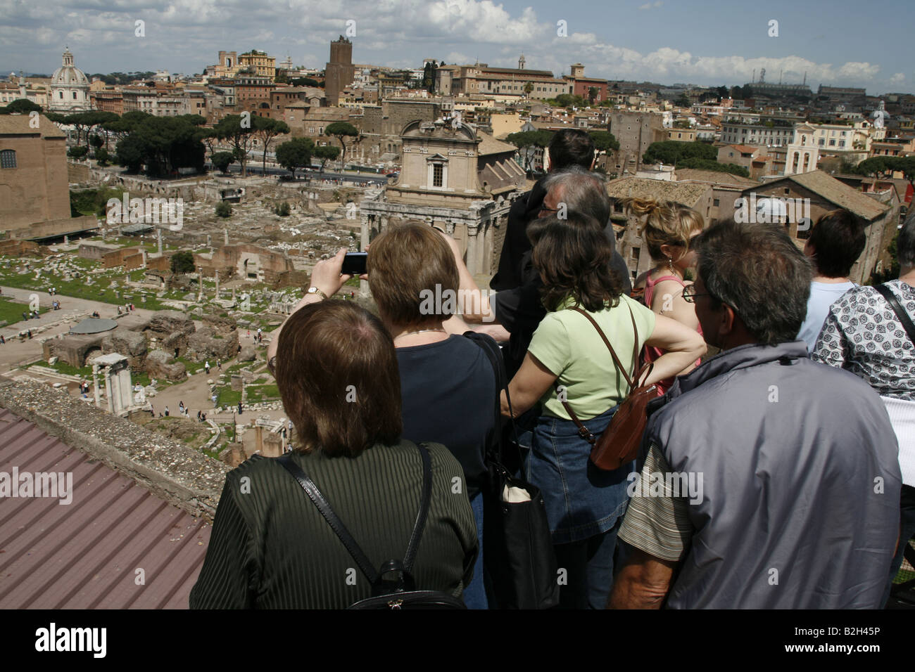 tourists looking at roman forum, rome, italy Stock Photo - Alamy