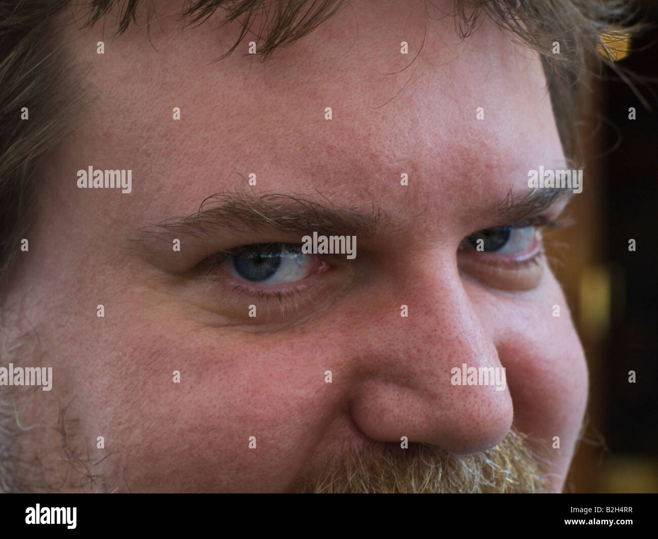 A man looking at the camera Stock Photo - Alamy