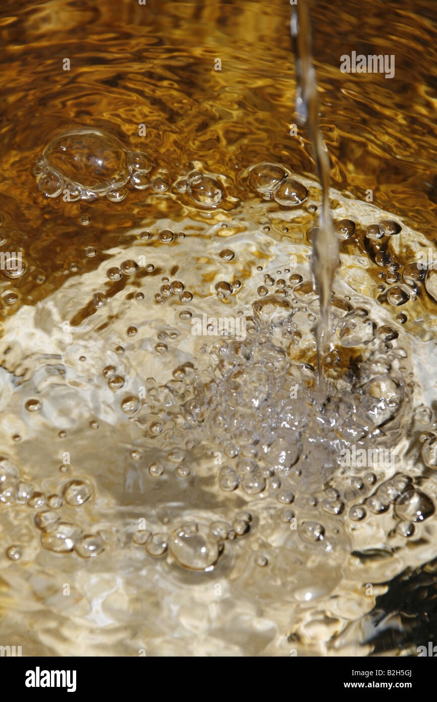 clean water falling into pool on fountain Stock Photo - Alamy