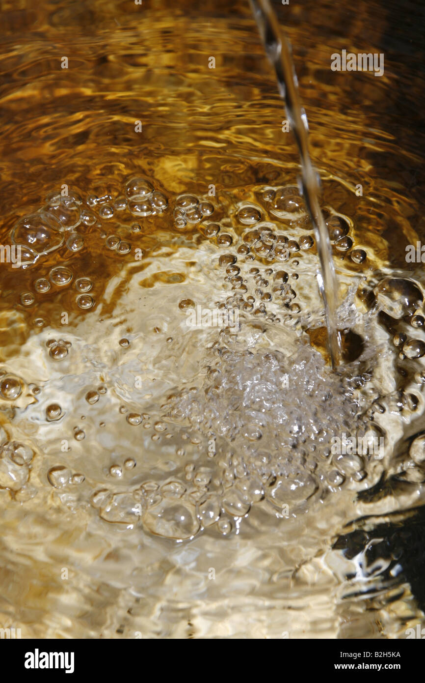 clean water falling into pool on fountain Stock Photo - Alamy
