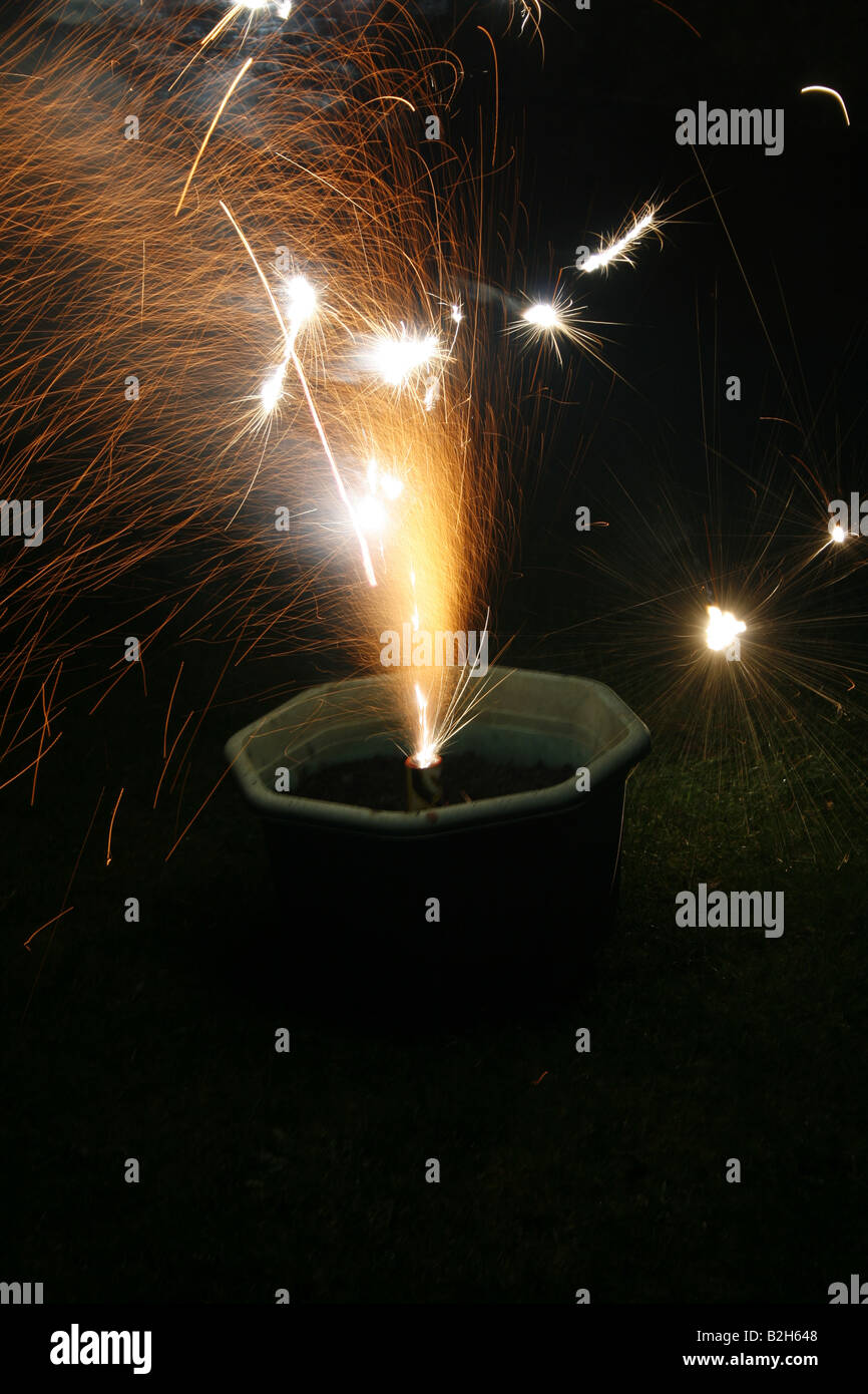 colourful sparks in fireworks display in garden Stock Photo - Alamy