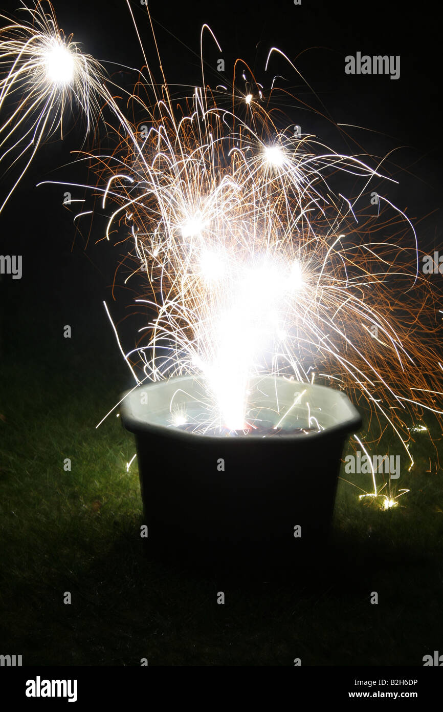 colourful sparks in fireworks display in garden Stock Photo - Alamy