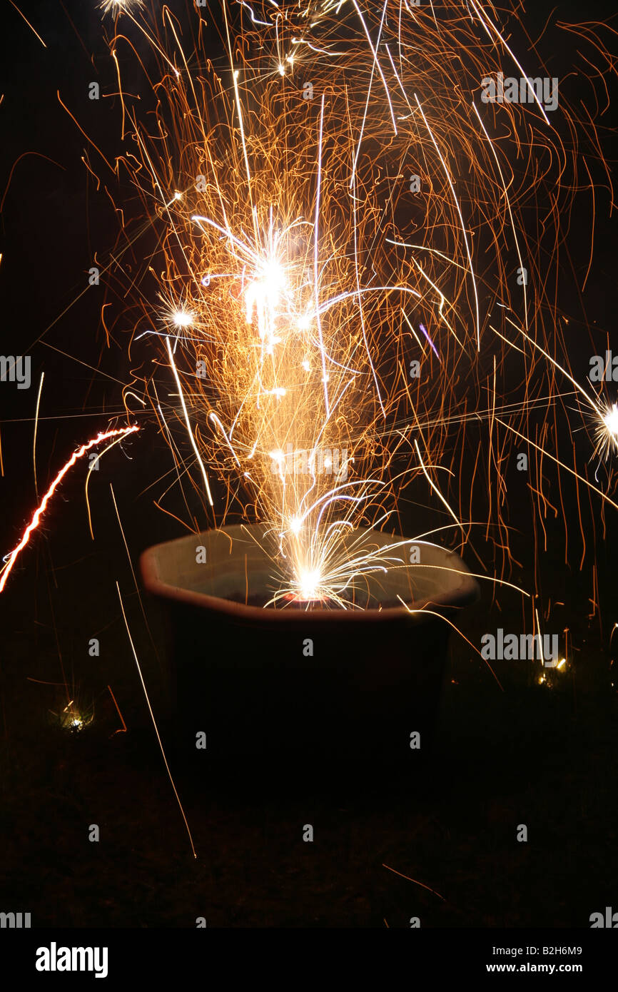 colourful sparks in fireworks display in garden Stock Photo - Alamy