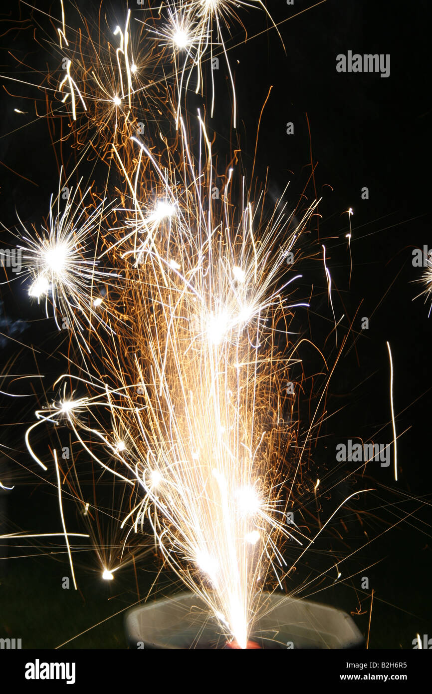 colourful sparks in fireworks display in garden Stock Photo - Alamy