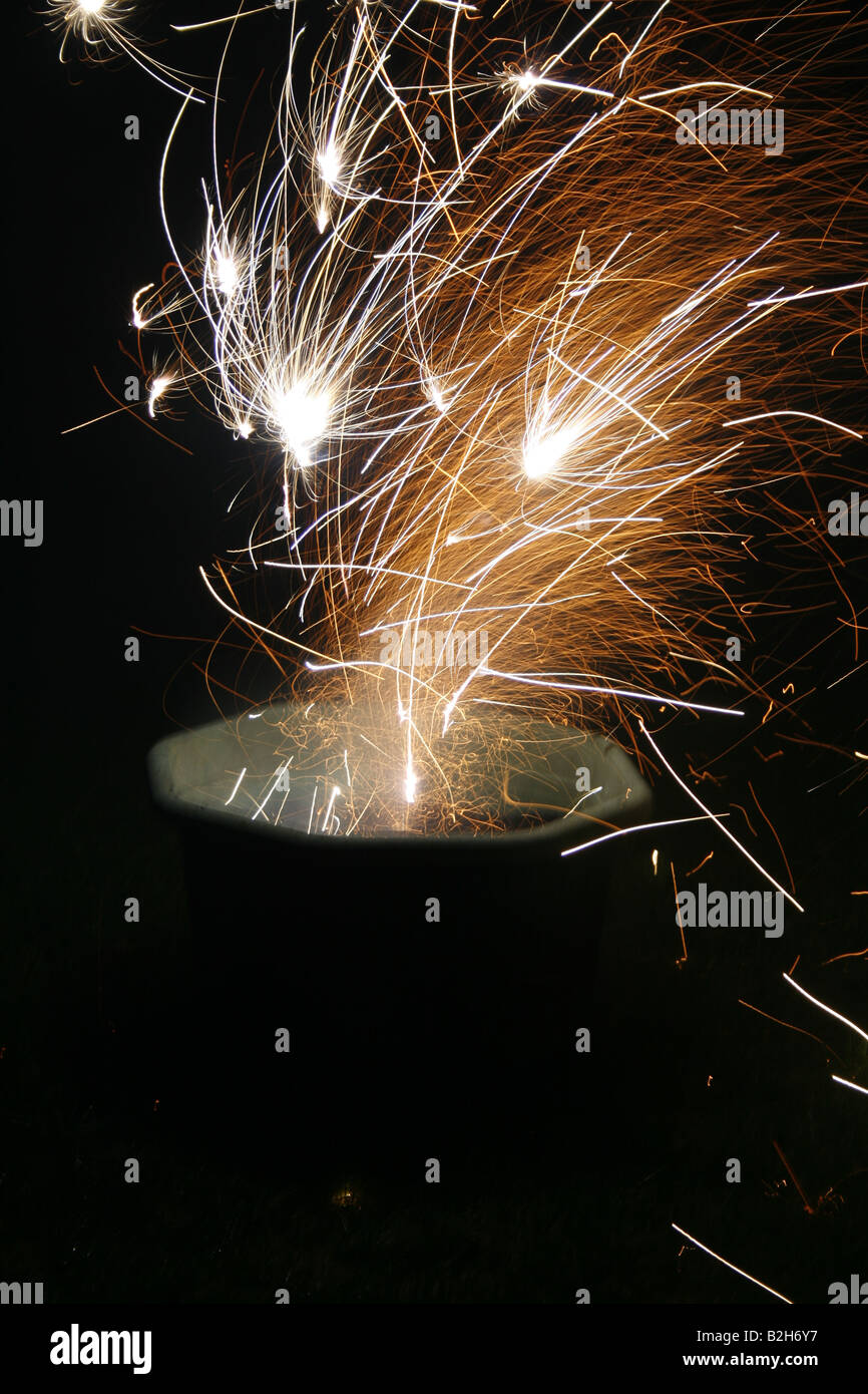 colourful sparks in fireworks display in garden Stock Photo - Alamy