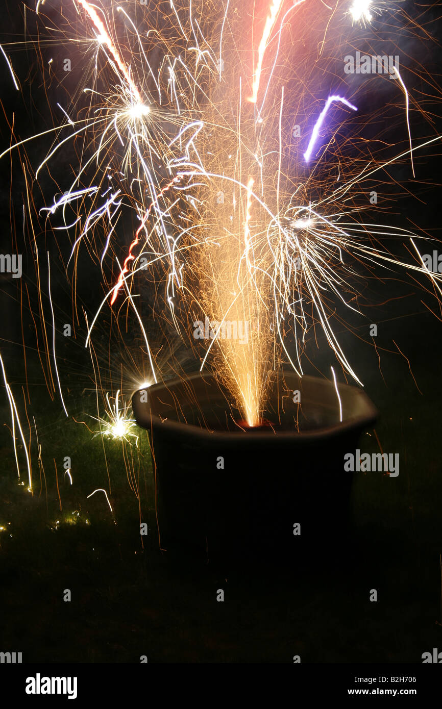 colourful sparks in fireworks display in garden Stock Photo - Alamy