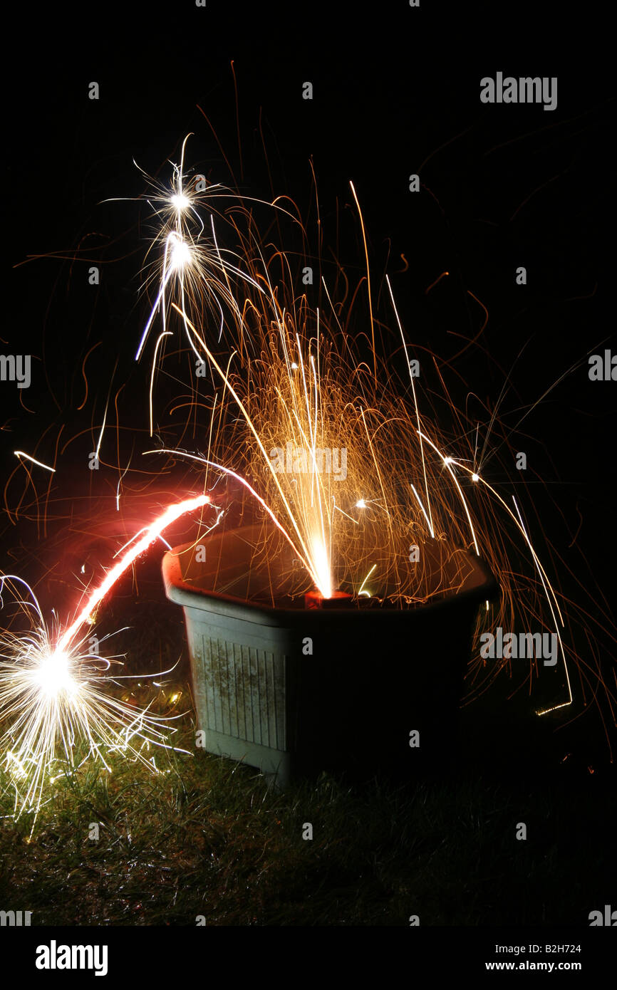 colourful sparks in fireworks display in garden Stock Photo - Alamy