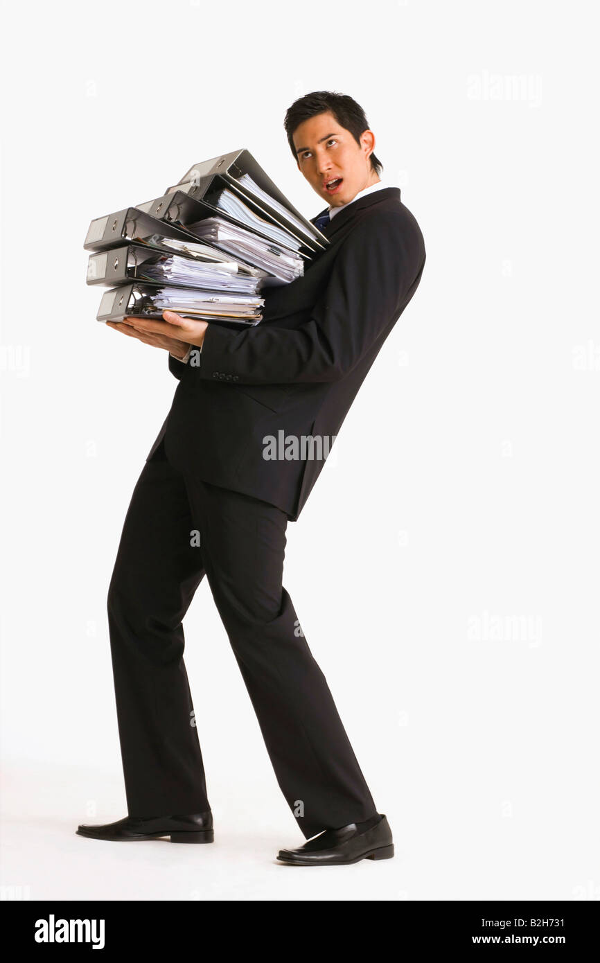 Burdened chinese man hi-res stock photography and images - Alamy