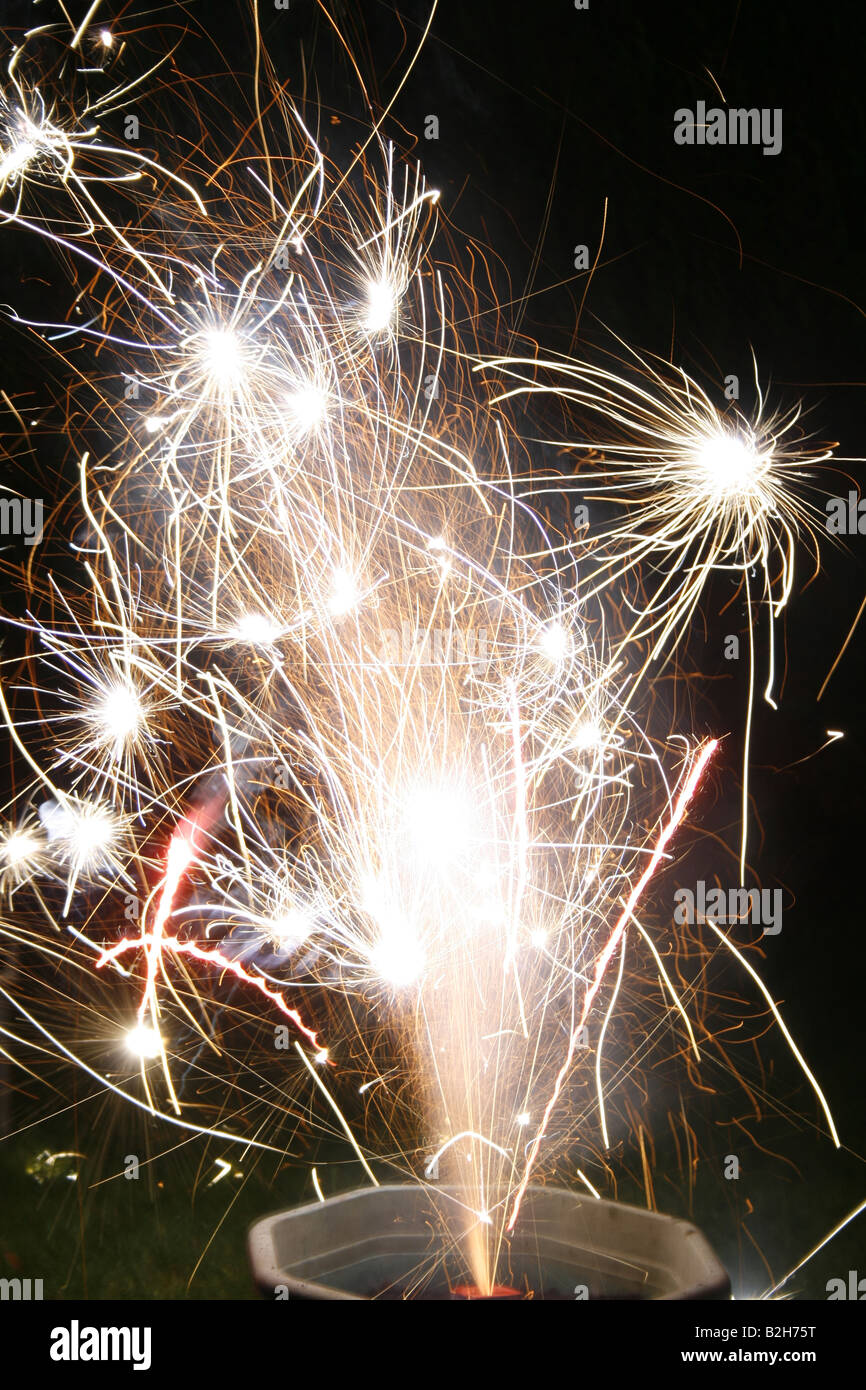 colourful sparks in fireworks display in garden Stock Photo - Alamy