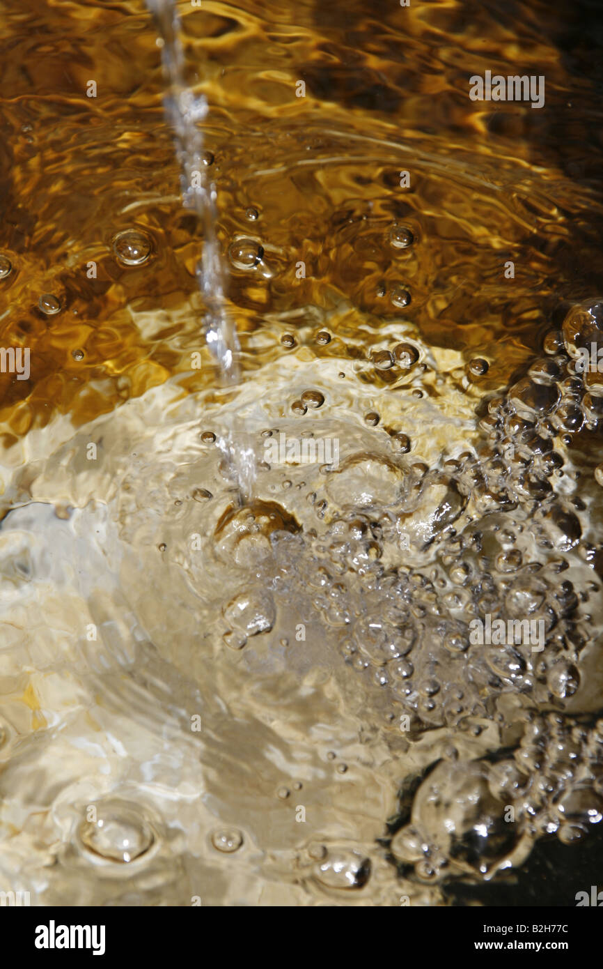 clean water falling into pool on fountain Stock Photo - Alamy