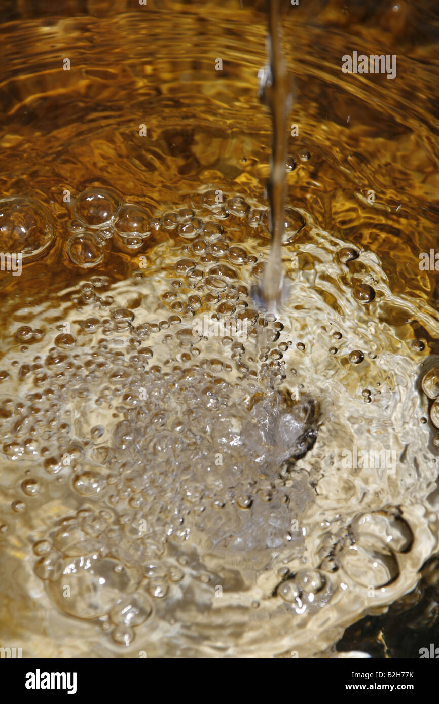 clean water falling into pool on fountain Stock Photo - Alamy